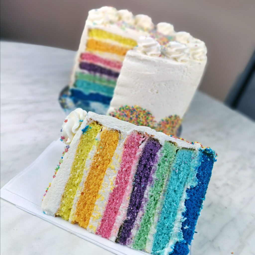 Tall Rainbow Cake - Quigleys